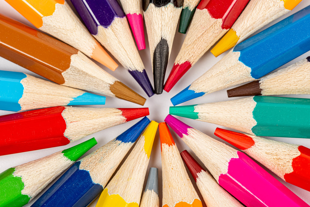 Colored Pencils Positioned In A Circle With The Tip Towards The Center